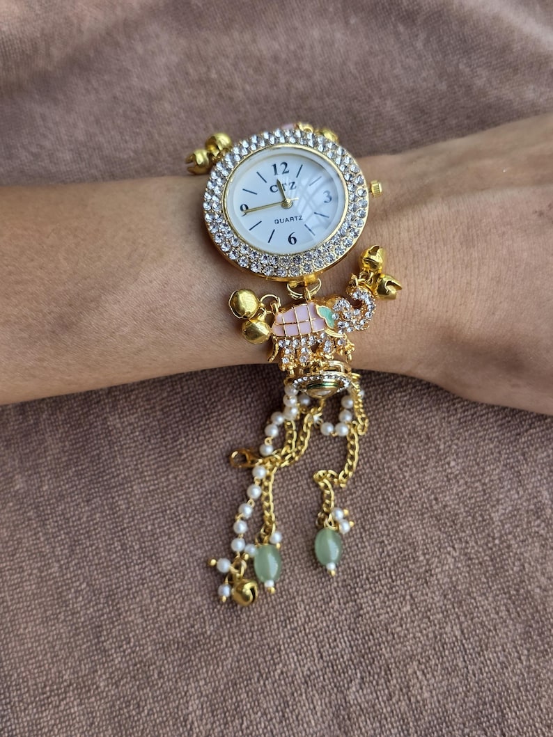 Gold-plated Meenakari Elephant Watch – Kundan Pearl Chain Bracelet ...