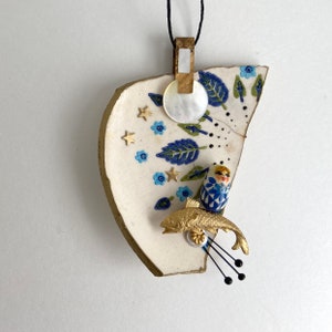 Quirky Found Object Mixed Media Collage Folk Art. Nesting Doll Riding a ...