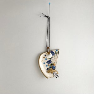 Quirky Found Object Mixed Media Collage Folk Art. Nesting Doll Riding a ...