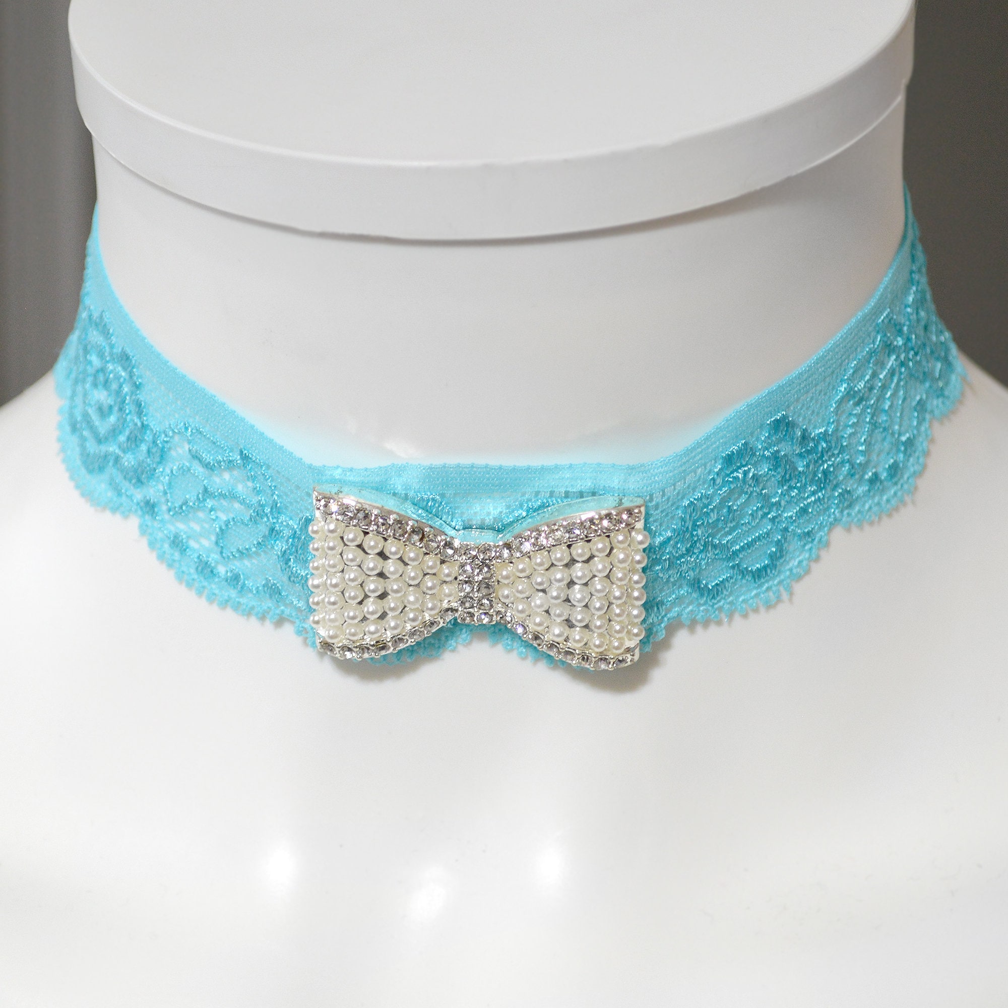 Put a Bow on It Stretchy Lace Blue Stretchy Choker With a Sparkling ...