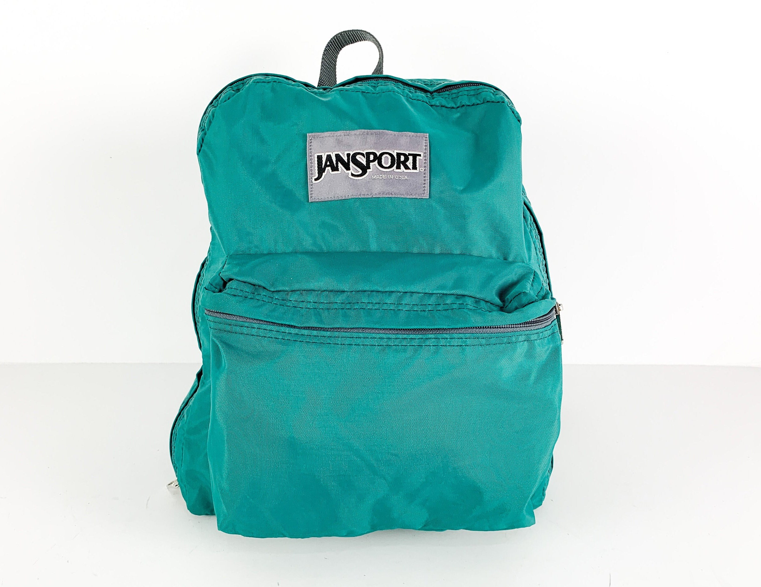 Blue Jansport Backpack