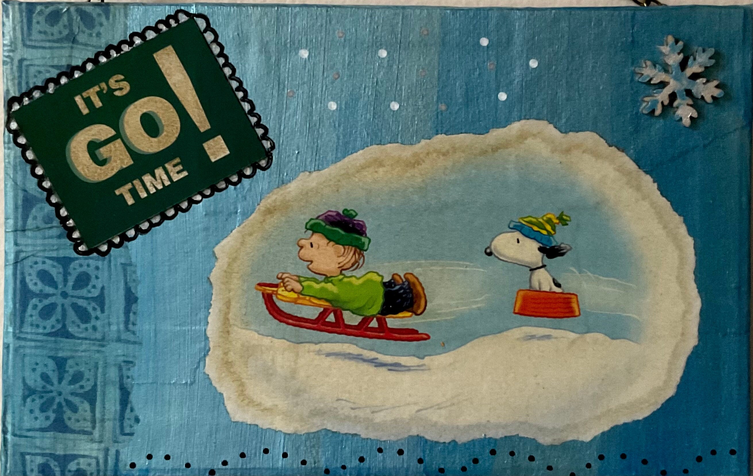 Snoopy Sled Riding