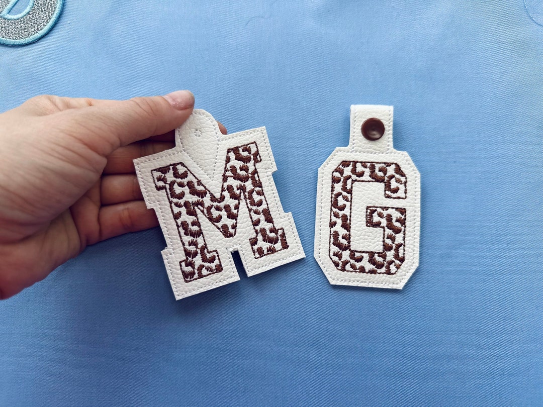 Leopard Print Monogram Eyelet and Key Fob Snap Tab Block Font Alphabet ...