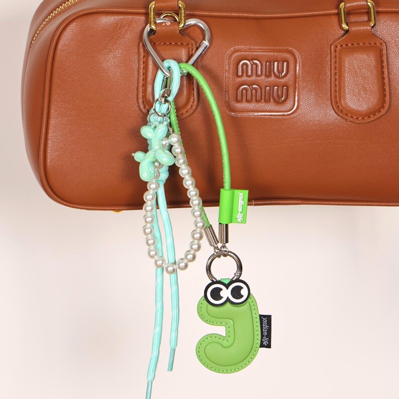 Cute Leather Rope Keychain With Balloon Dog Charm – Stylish Bag ...