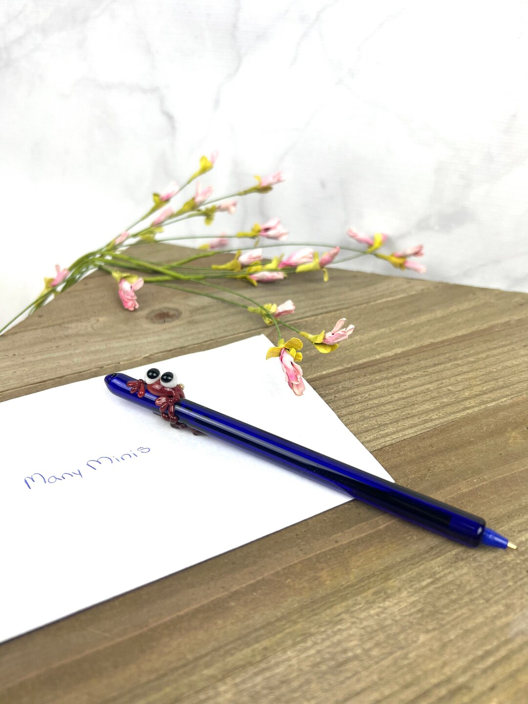 Rust Red Frog With Butter Yellow Spots on a Cobalt Blue Glass Writing ...