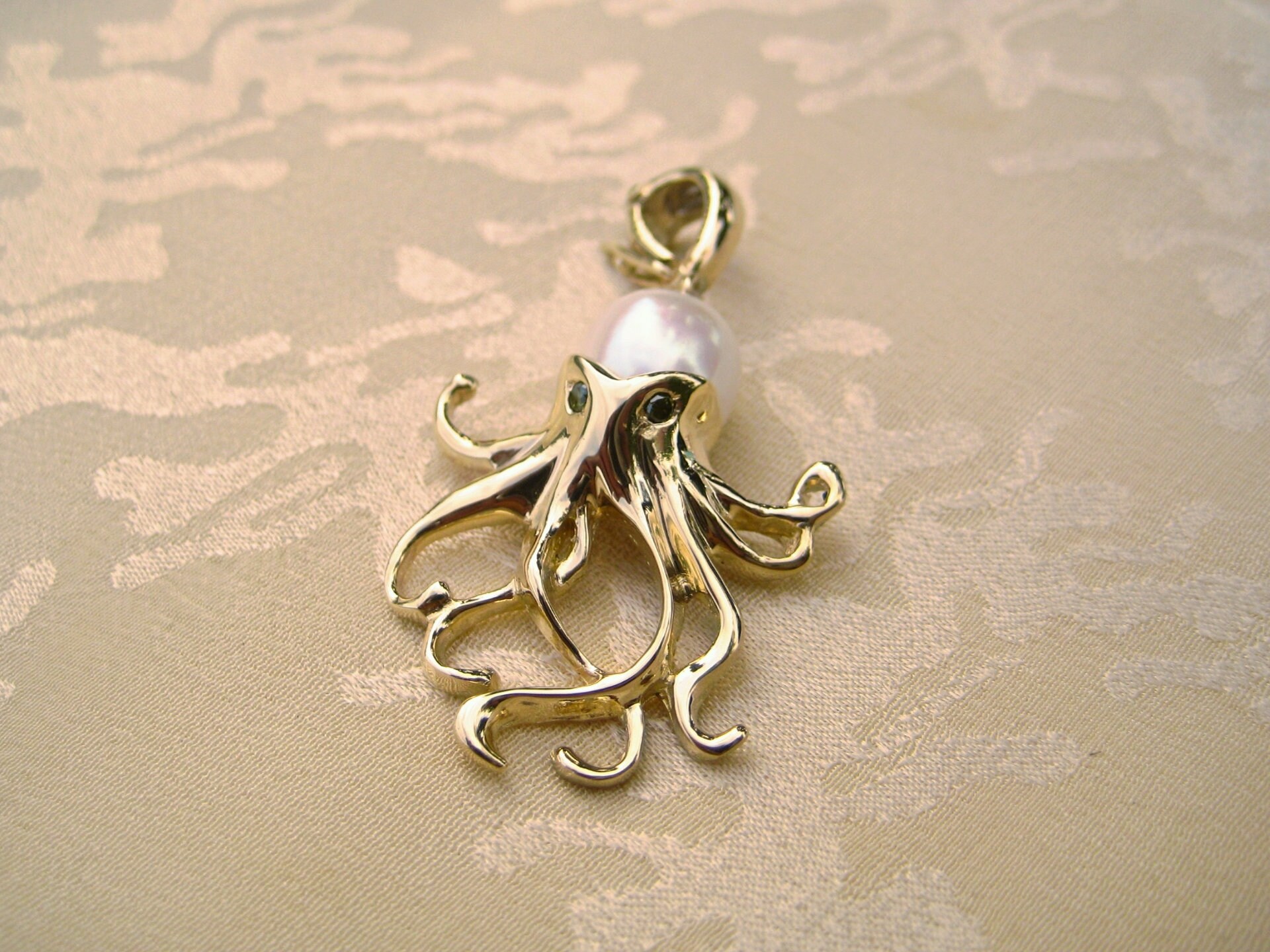 Gold octopus pendant store