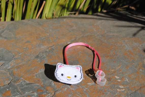 Hello Kitty Implants