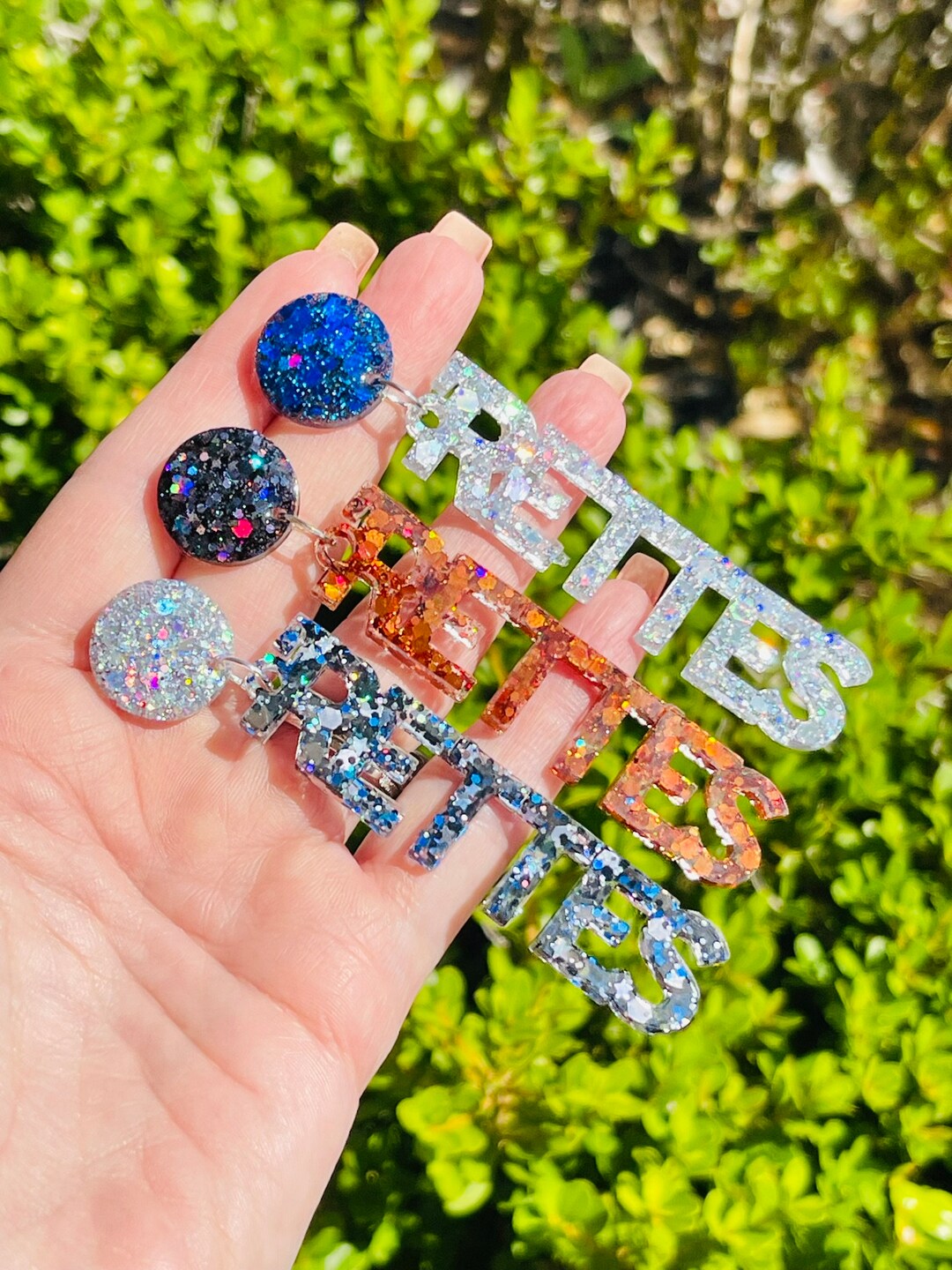 Rettes Glitter Resin Word Earrings - Texas City Stingarettes ...