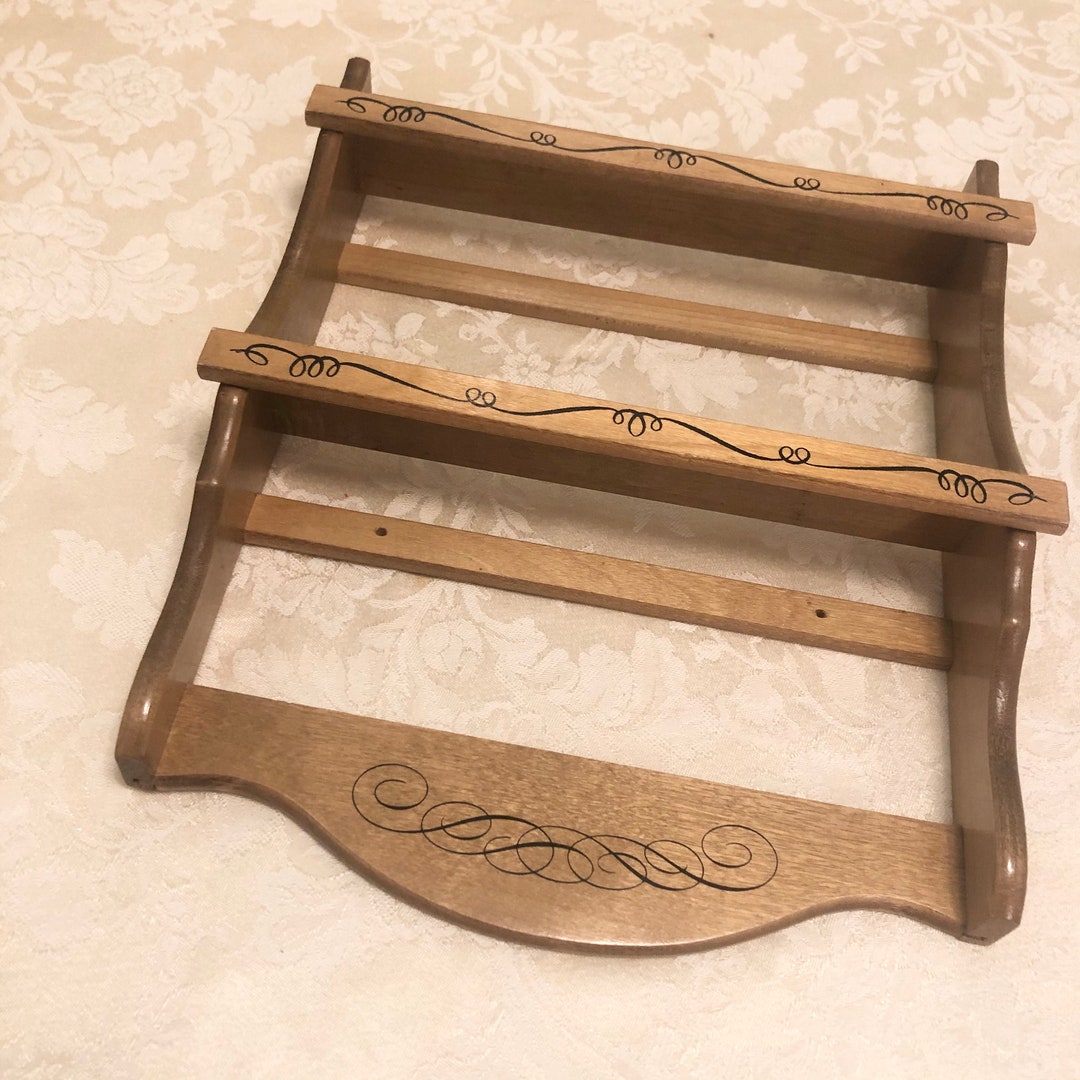Rustic Wooden Spice Rack With Stenciled Edged Fence Holding the Jars in ...