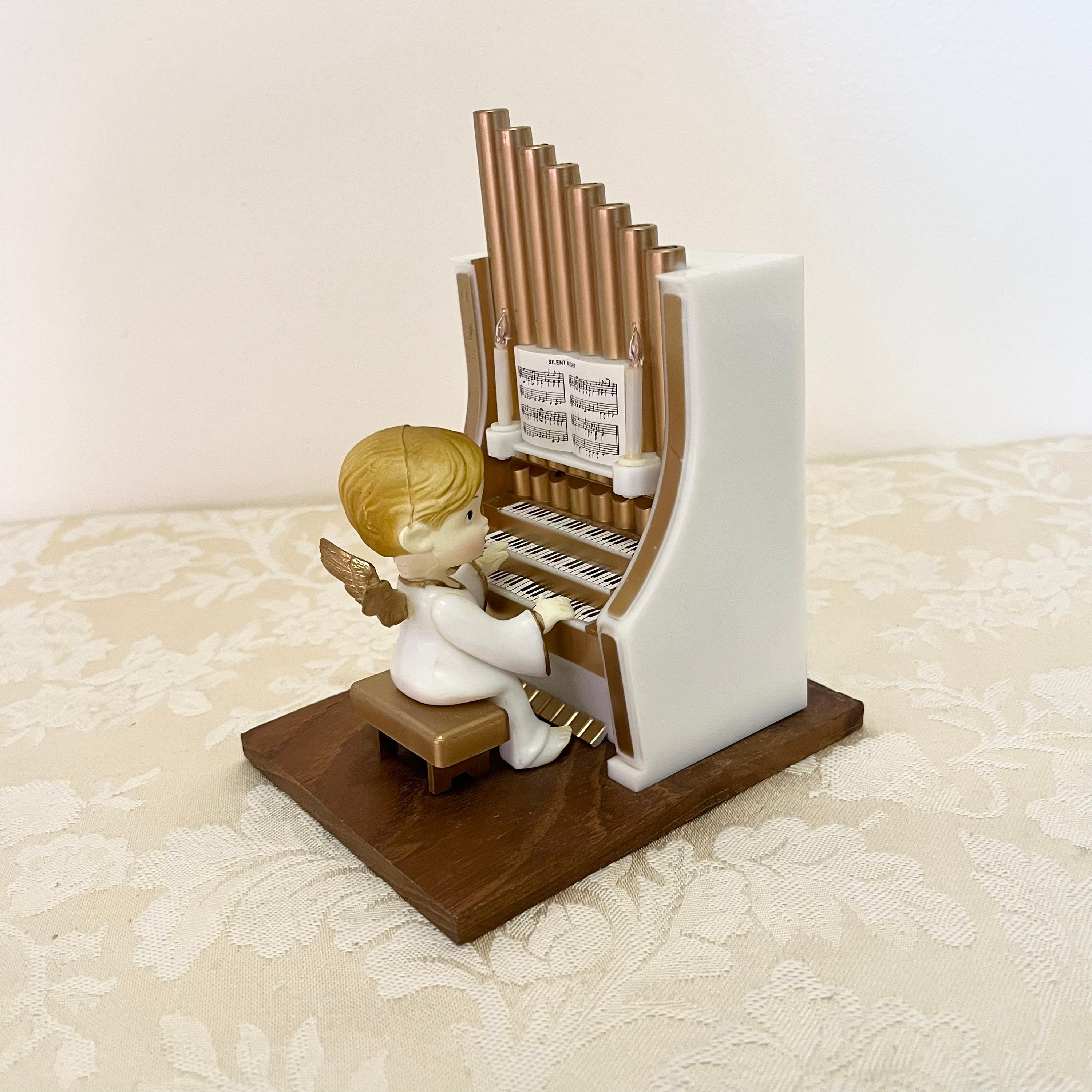 Angel Playing the Organ the Keyboard Instrument Lights up With Two ...