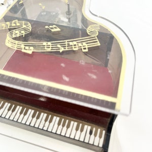 Piano Music Box Plays My Way Piano Top Box Piano Holding A Music Box in ...
