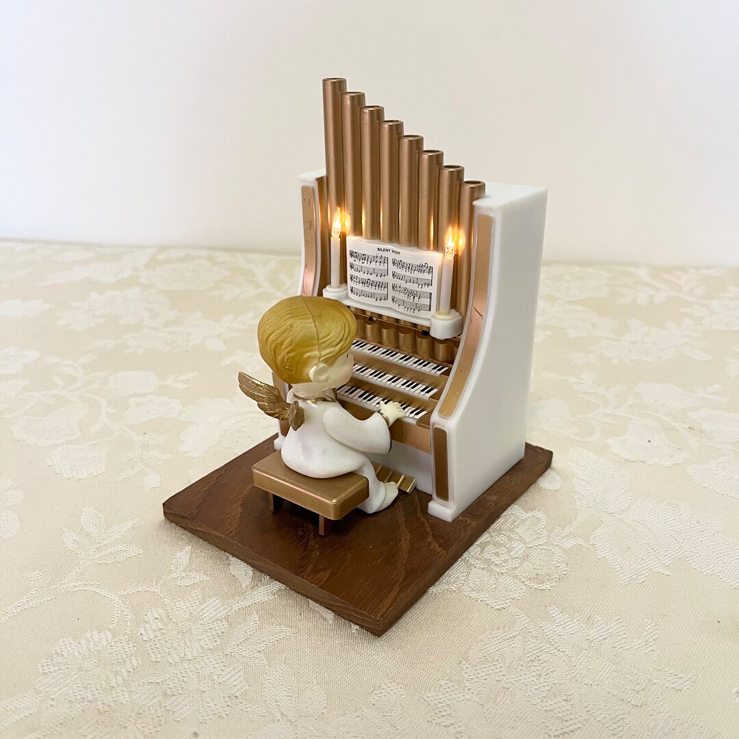 Angel Playing the Organ the Keyboard Instrument Lights up With Two ...