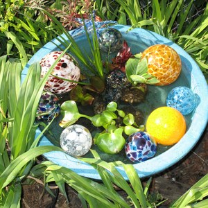 Pond Floats. Red Magic Mix Blown Glass. Available in 3 Inch, 4 Inch, 5 ...