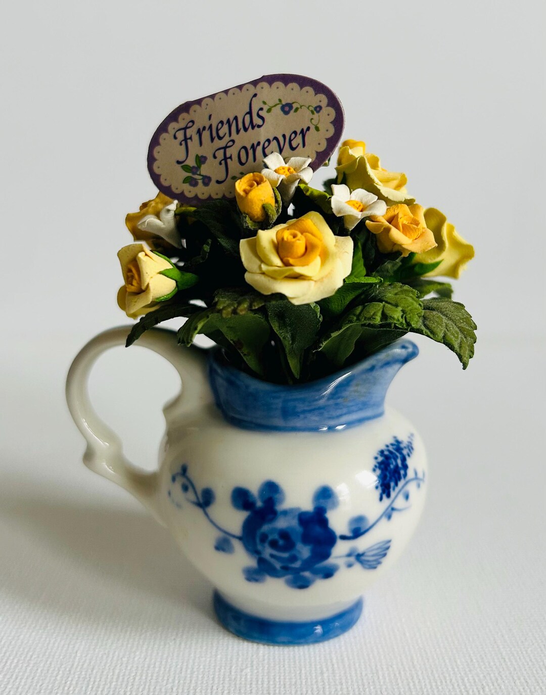 Vintage Ceramic Pitcher With Artificial Yellow Roses and a "friends ...