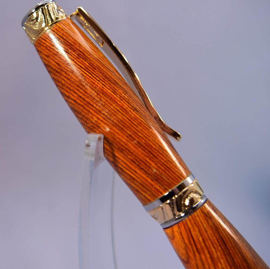 Sophisticated Birch Pen Showcasing a Layered Design With Artistic Gold ...