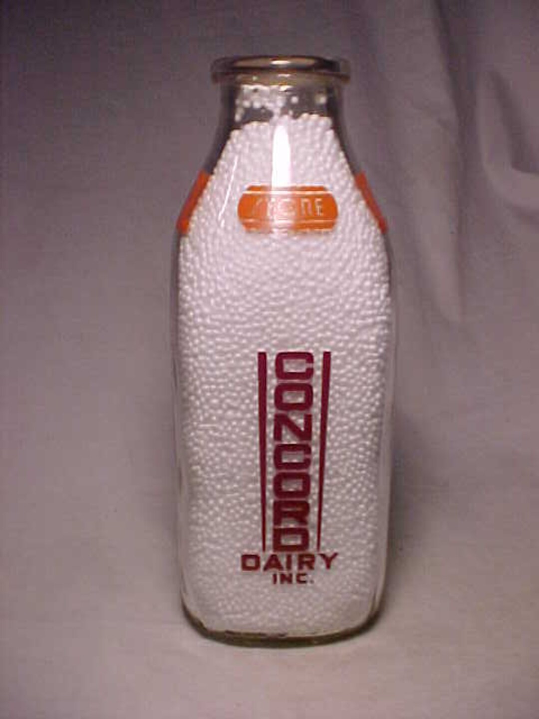 1950 Concord Dairy Inc. Concord, N.H., One Quart Maroon and Orange PYRO ...