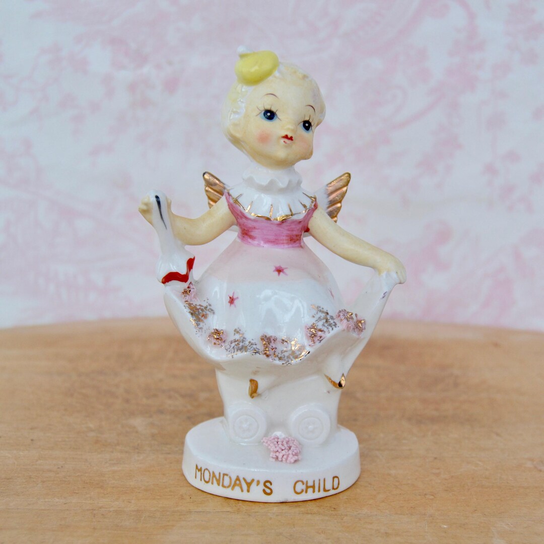 Vintage Monday's Child Ceramic Angel Figurine Sitting on Carriage by ...
