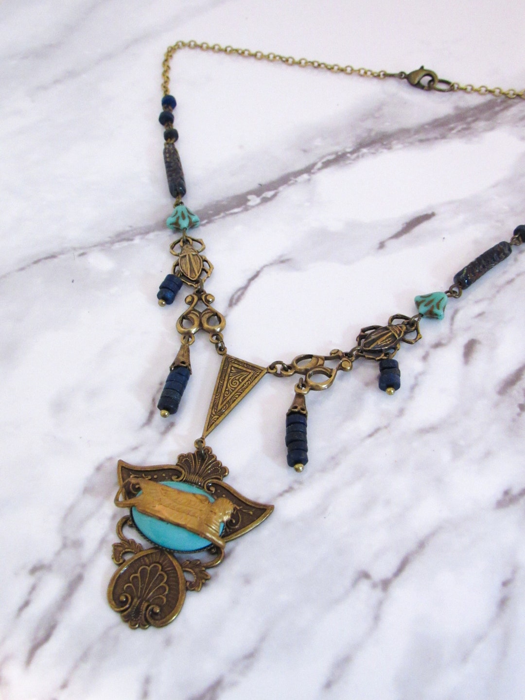 Egyptian Revival Sphinx Pendant Necklace in Brass, Czech Glass // 1920s ...