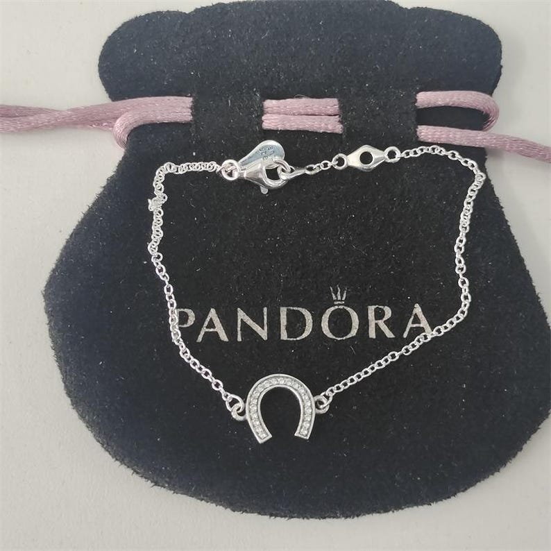 Pulsera Pandora de plata con símbolo de la suerte, herradura y ...
