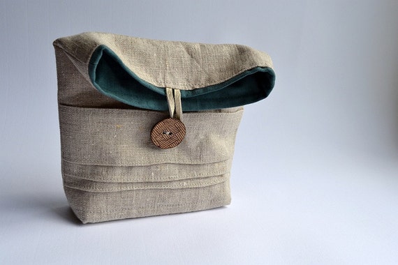 Items similar to Folded flat clutch fabric pockets natural teal striped ...