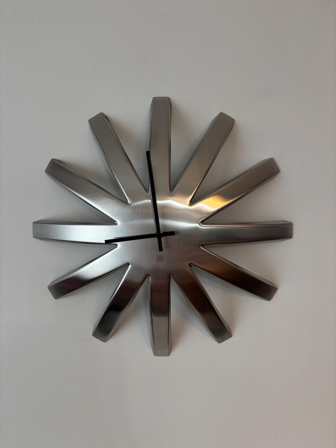 Umbra Ribbon Steel Wall Clock, Modern Chrome Sunburst Clock, Industrial ...