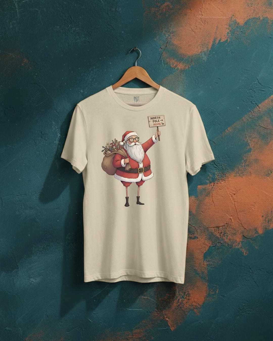 Hitchyclaus – Hitchhiking Santa Graphic Tee | Whimsical Holiday Shirt ...
