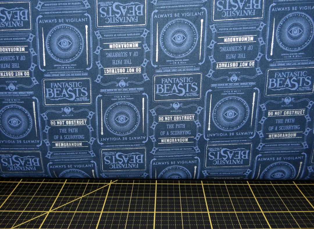 Camelot Fabrics. Wizarding World. Fantastic Beasts Newsprint & Symbols ...