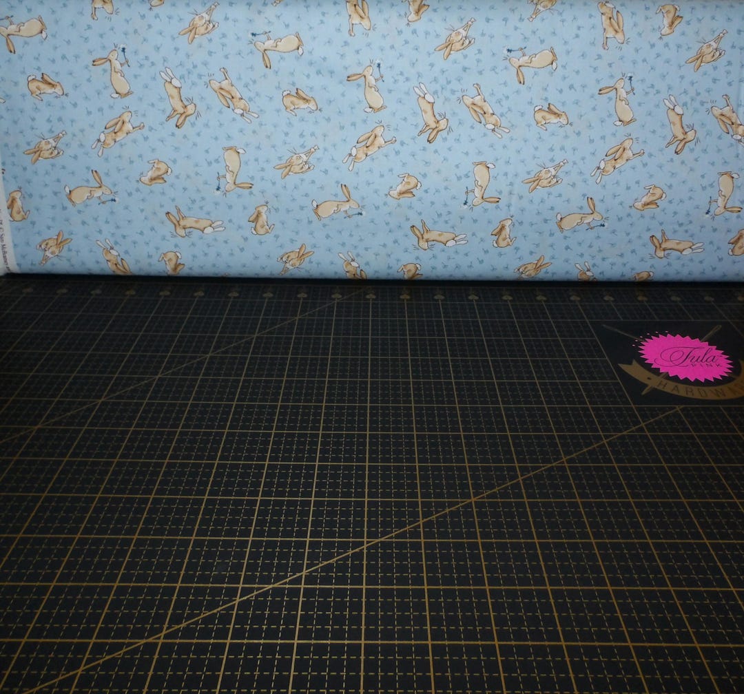 Clothworks. GHMILY 2024. Tossed Bunnies Light Denim - Guess How Much I ...