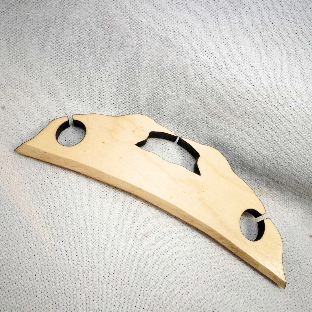 A Short Sword Form Curved Shuttle for Traditional Scandinavian Tape ...