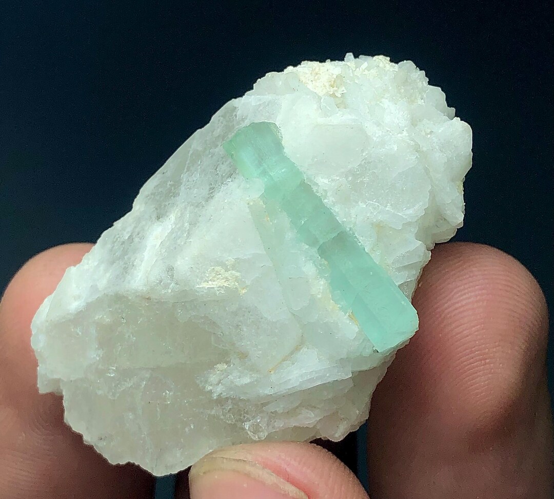 Natural Specimen Featuring a Green Tourmaline Crystal Embedded in a ...