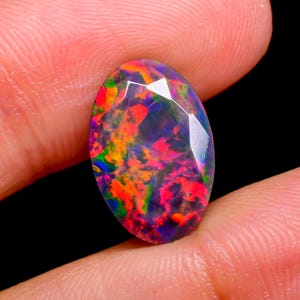 3 Ct AAA Grade Rainbow Fire Ethiopian Black Opal: Cabochon Oval Faceted ...