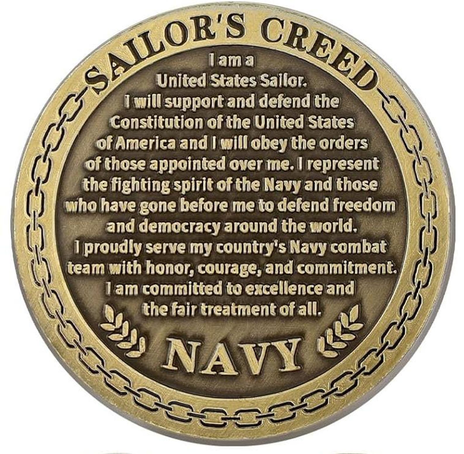 Navy EST. 1775." the Coin Also Includes the Words "honor Courage ...