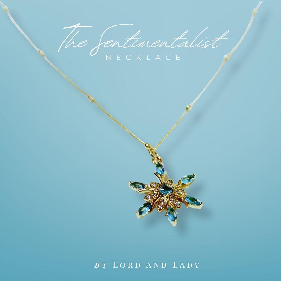 The Sentimentalist Necklace – Gold Snowflake Pendant With Blue Stones ...