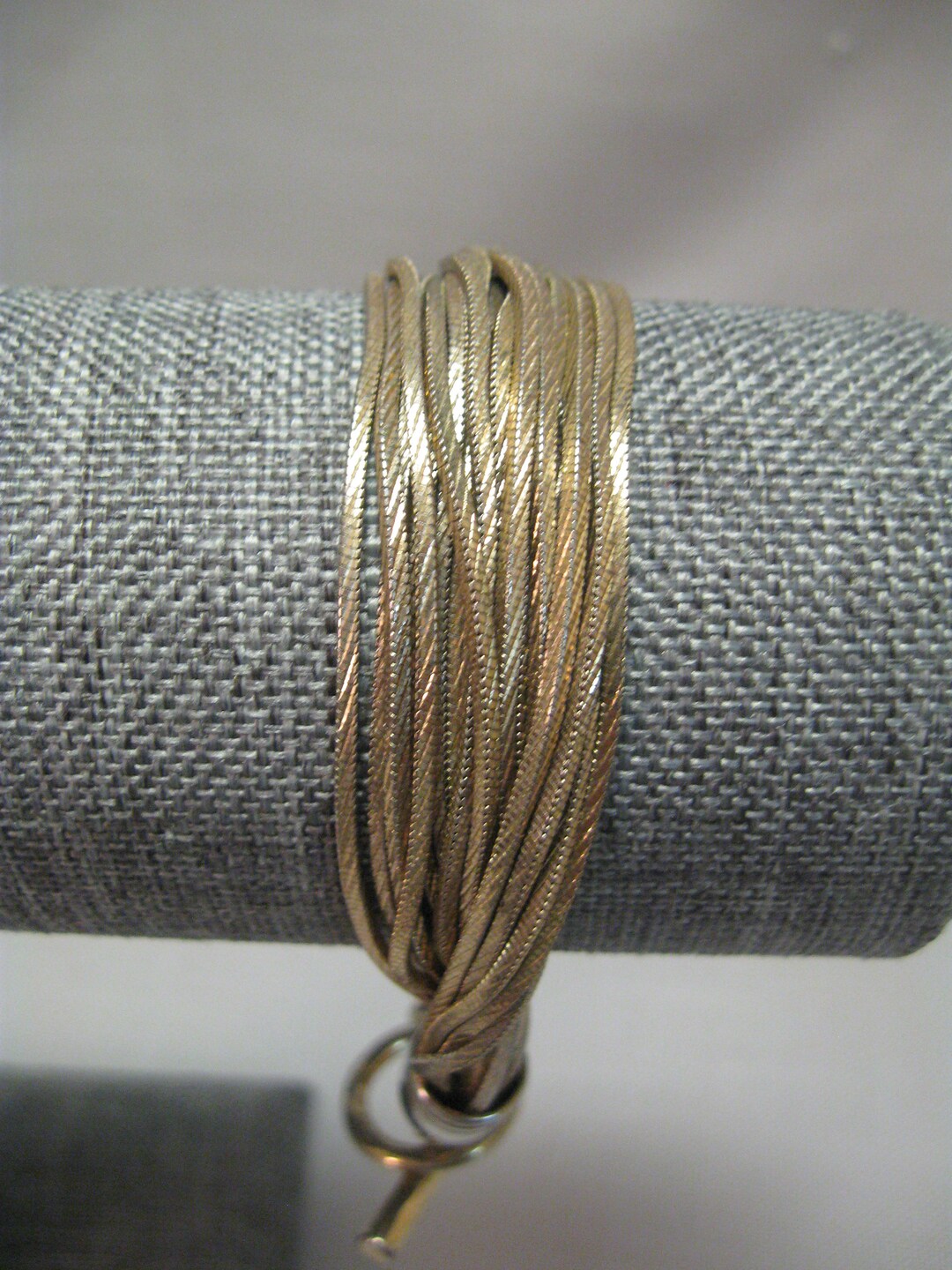 Bracelet Gold Tone Multi Chains 18 Strands Toggle Clasp 8 3/4 Inches in ...