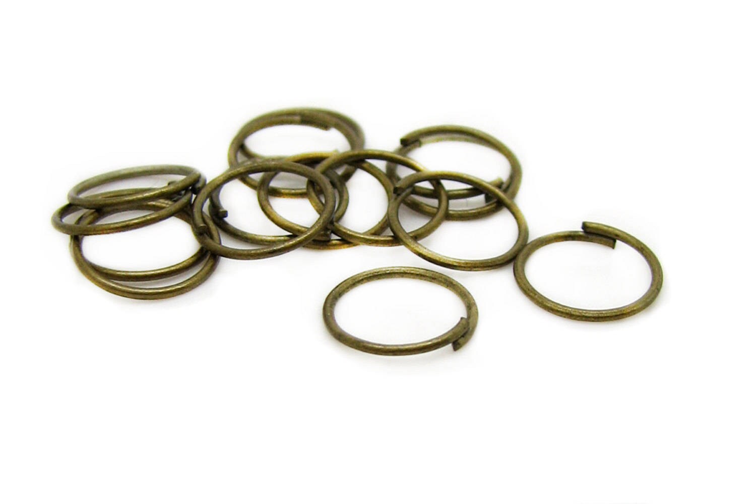 Antique Bronze Open Jump Ring Findings 10mm x .7mm 21 gauge | Etsy