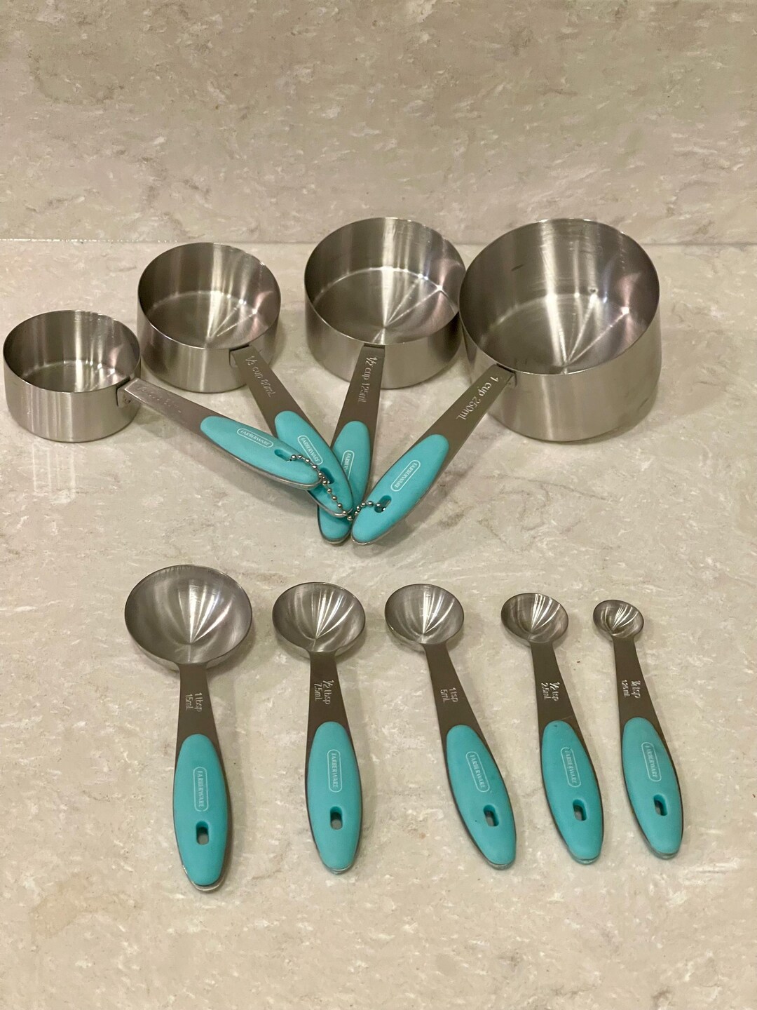Stainless Steel Measuring Spoons and Measuring Cups Have Aqua Blue ...