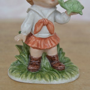 Vintage Ceramic Figurine of Little Girl Holding a Turtle by Brinn's ...