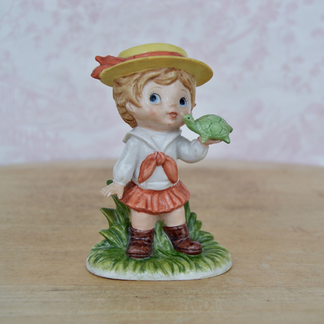 Vintage Ceramic Figurine of Little Girl Holding a Turtle by Brinn's ...