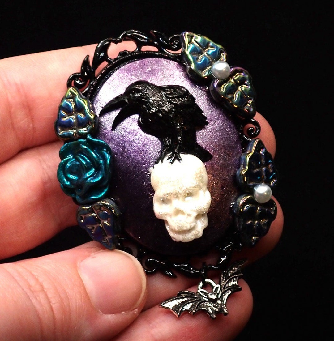 Crow on a Skull Cameo With Bat Charm, Teal Rose, Oil Slick Leaves and ...