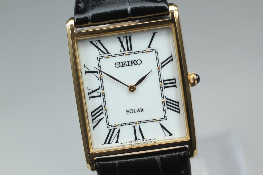Vintage Seiko Solar Tank Watch: SUP880 White Roman Dial, Japan - Etsy ...