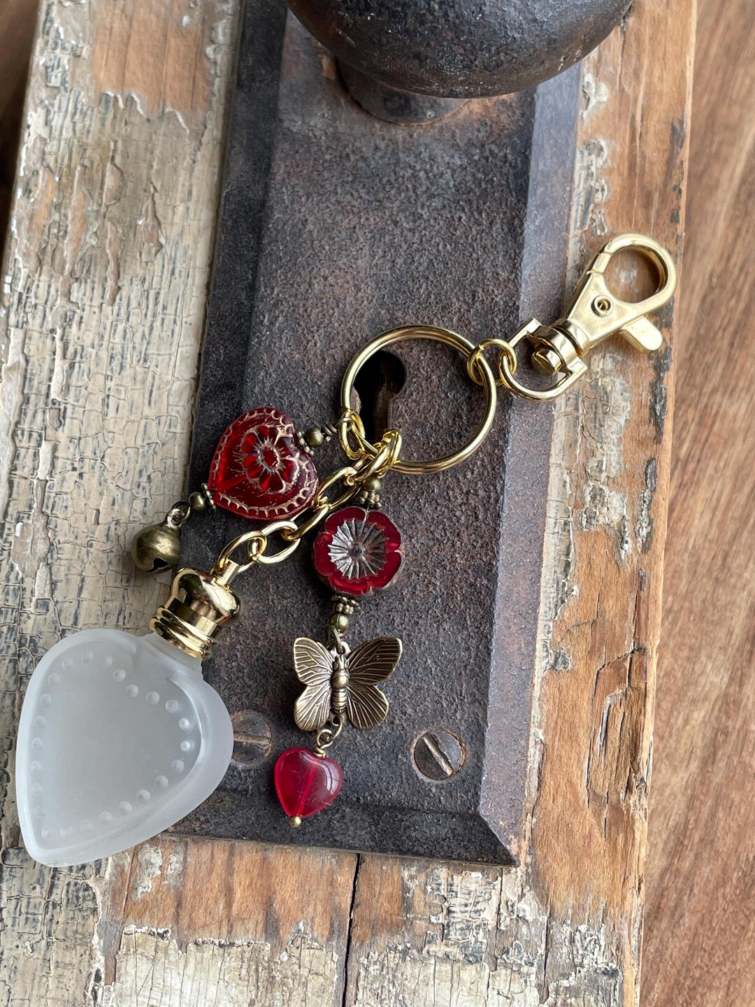 Perfume Bottle Keychain With Hearts, Butterfly and Bells Purse Charm ...