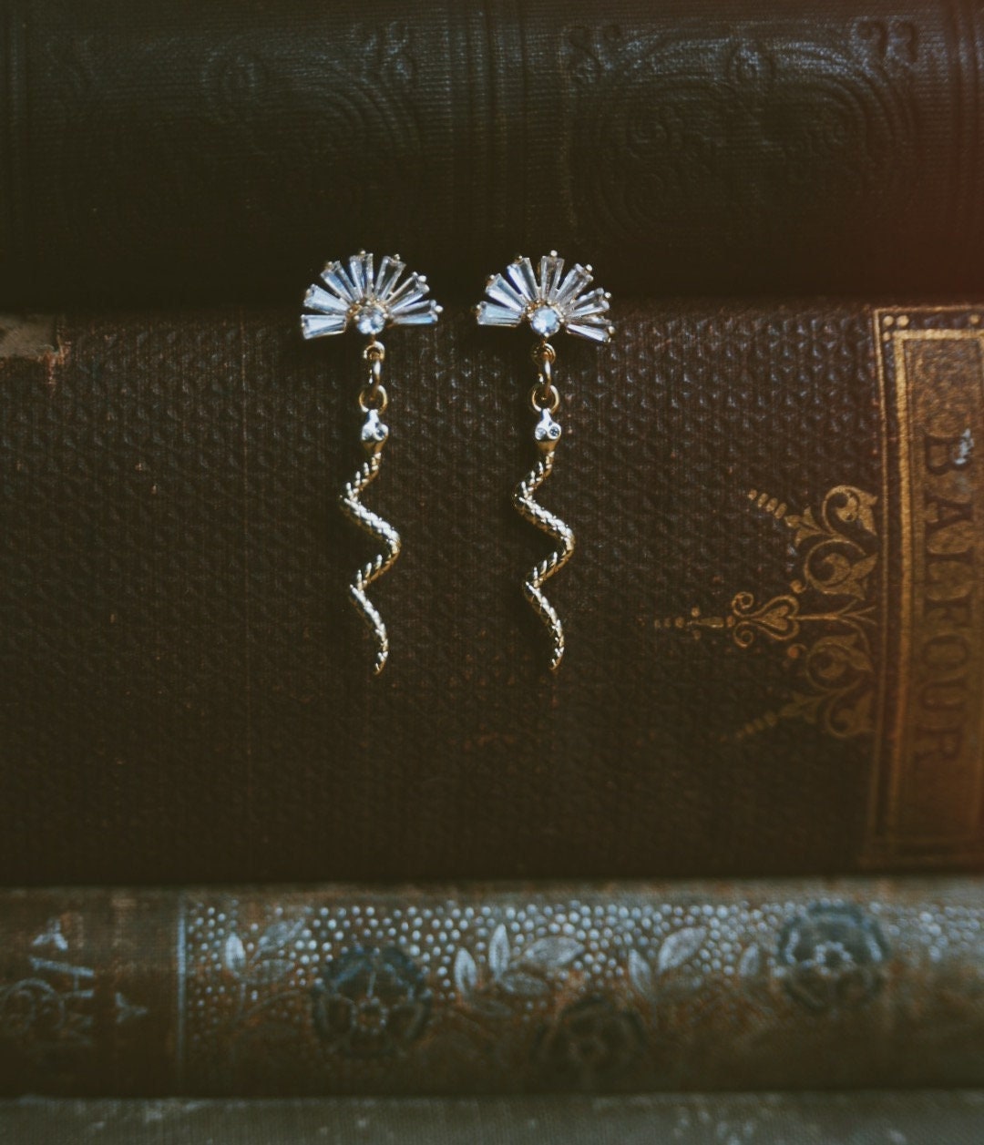 Sol Serpent. a Pair of Bohemian Cubic Zirconia and Golden Snake Art ...