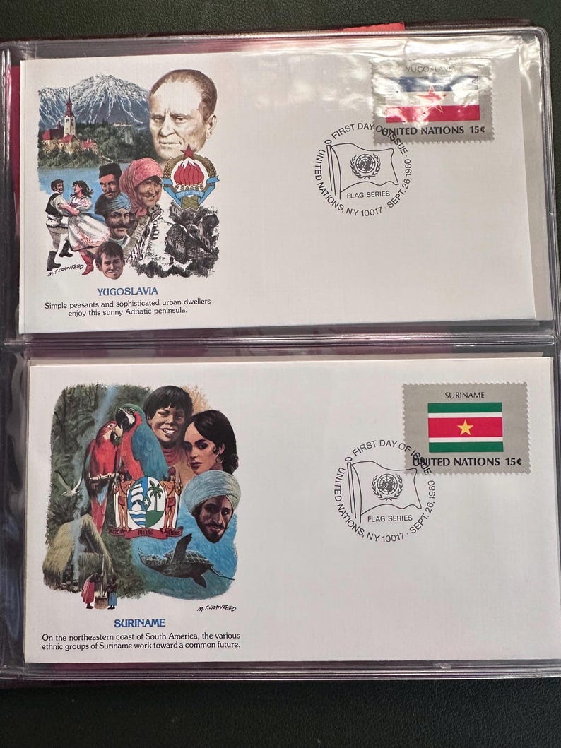 1980 Flags of United Nations Series - 14 First Day Covers in a Leather ...