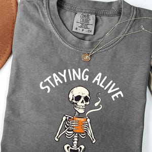 Staying Alive Skeleton Shirt: Funny Coffee Lover's Retro Halloween Tee ...