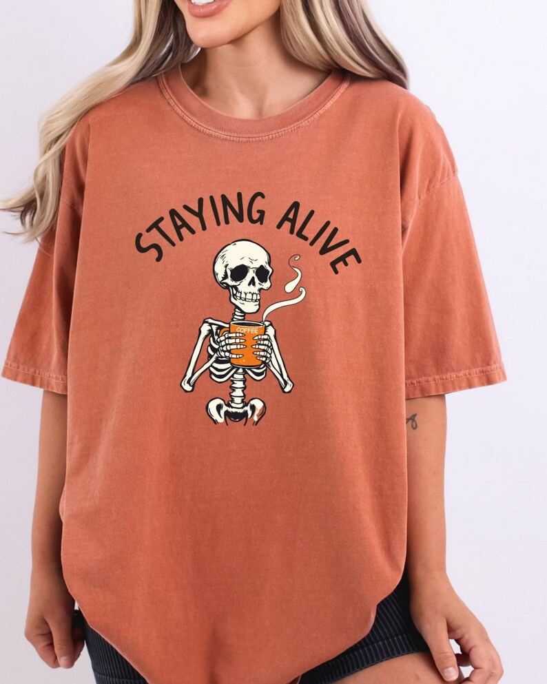 Staying Alive Skeleton Shirt: Funny Coffee Lover's Retro Halloween Tee ...