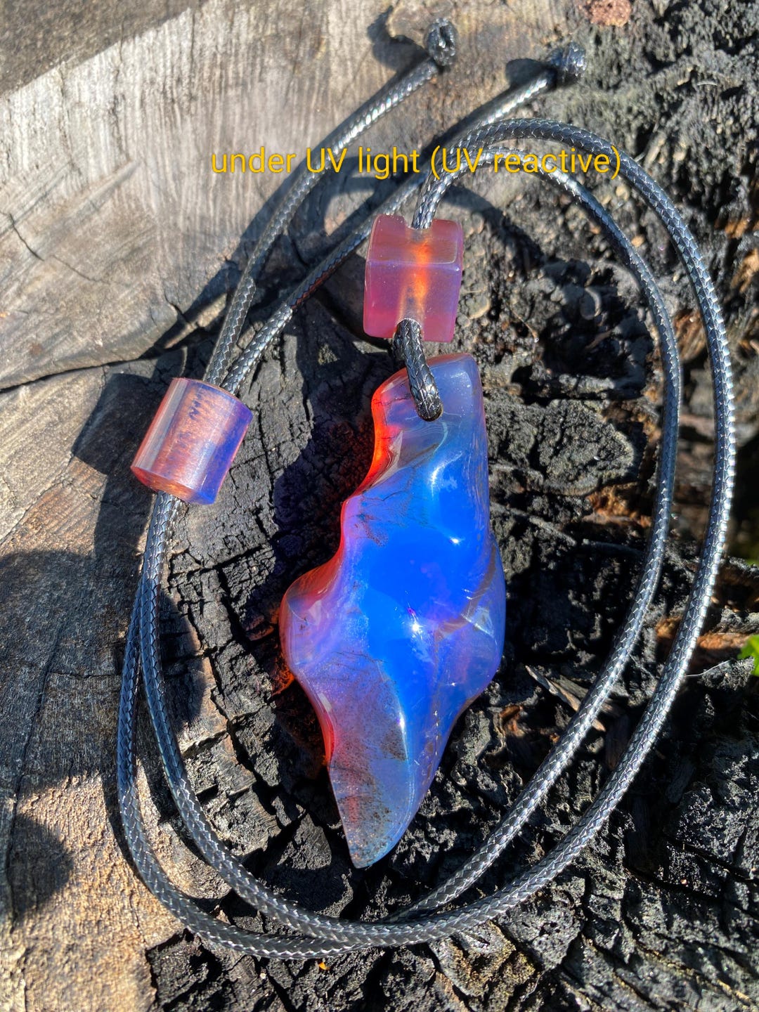 Hand Carved Sumatran Blue Amber Pendant: UV Reactive Gemstone Necklace ...