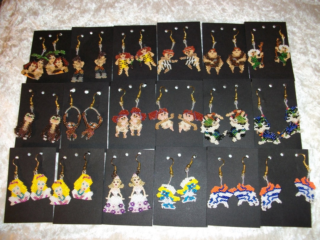 Disney Earrings the Croods Barbie Doll Smurette Broncos Tigers Caveman ...