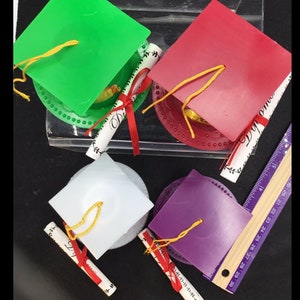Graduation Cap and Diploma Sets Grad Caps and Diplomas in Green, Red ...