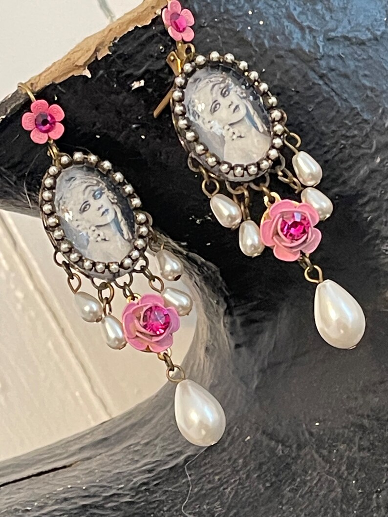 Hollywood Starlet Earrings Surrounded by Pearls and Pink Flowers. #47 ...