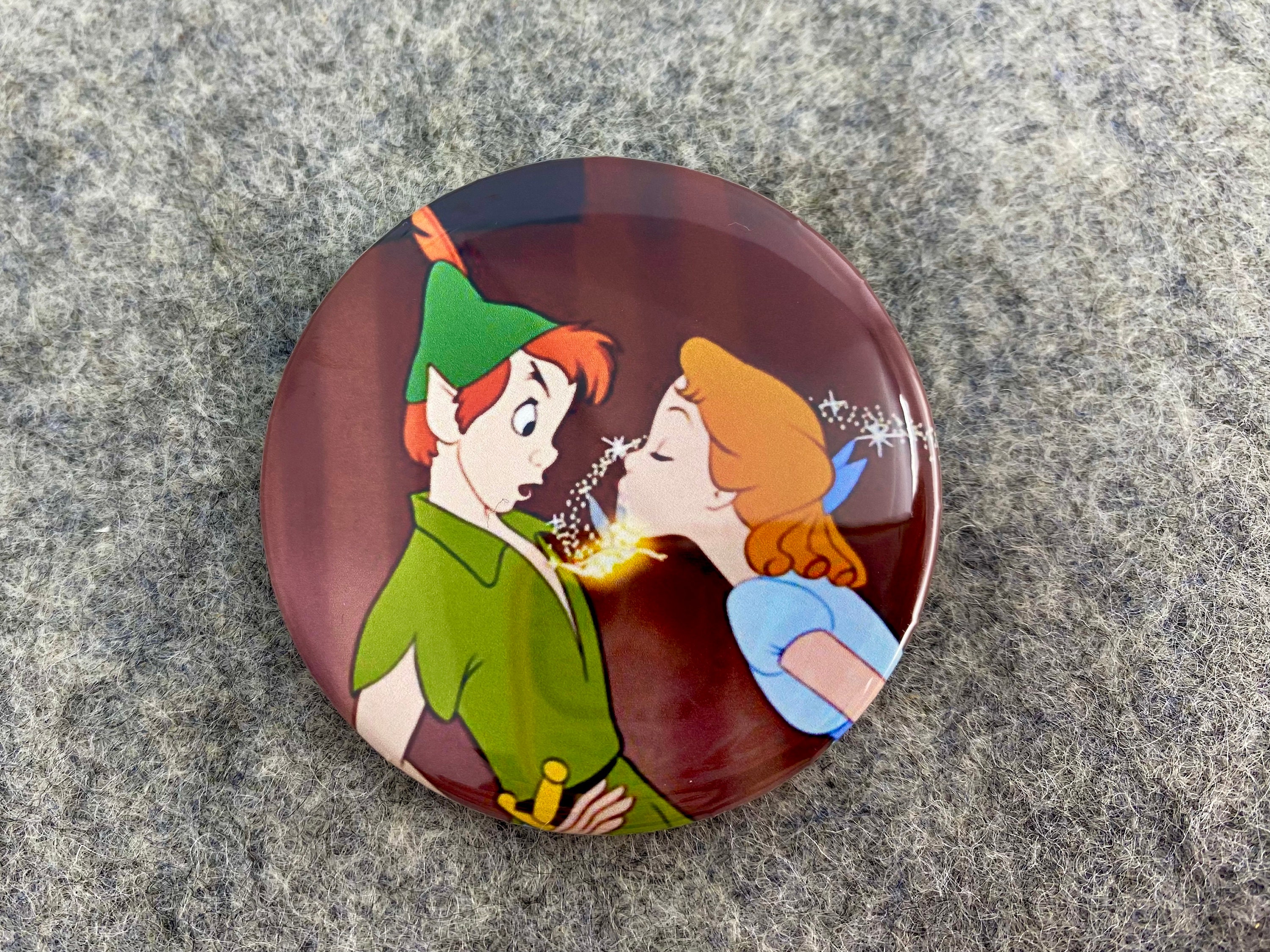 Tinkerbell And Peter Pan Kissing